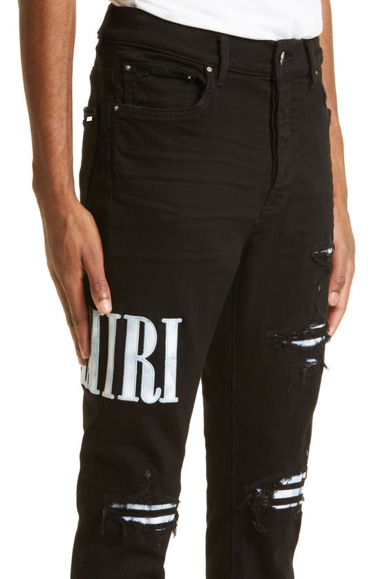 Amiri Tie Dye Core Logo Skinny Jean In Black | ModeSens