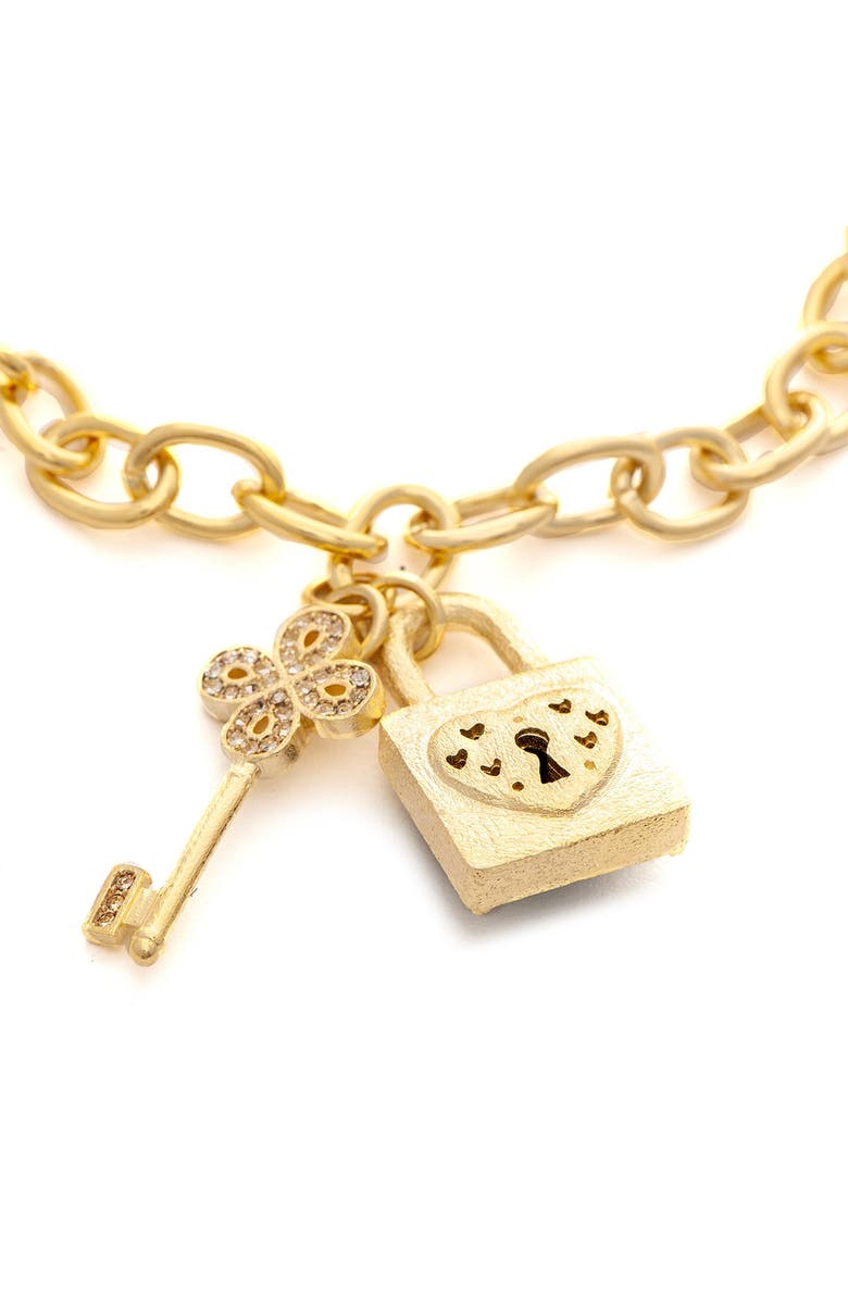 RIVKA FRIEDMAN 18K Gold Clad Satin Finish Onyx Lock and Cubic Zirconia ...