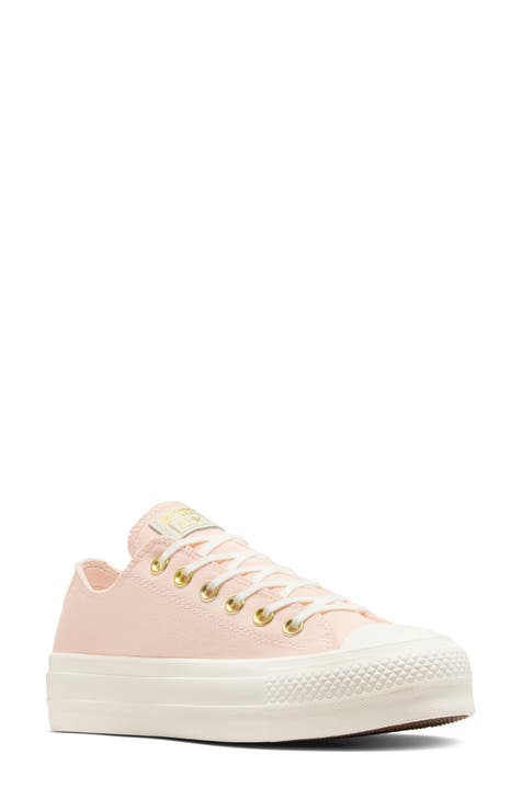 Pink and gold converse store