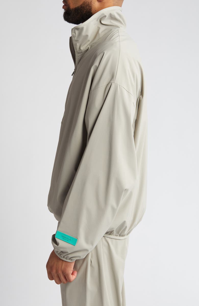 Fear of God Essentials Oversize Half Zip Stretch Nylon Pullover ...