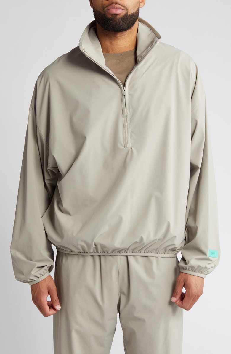 Fear of God Essentials Oversize Half Zip Stretch Nylon Pullover ...